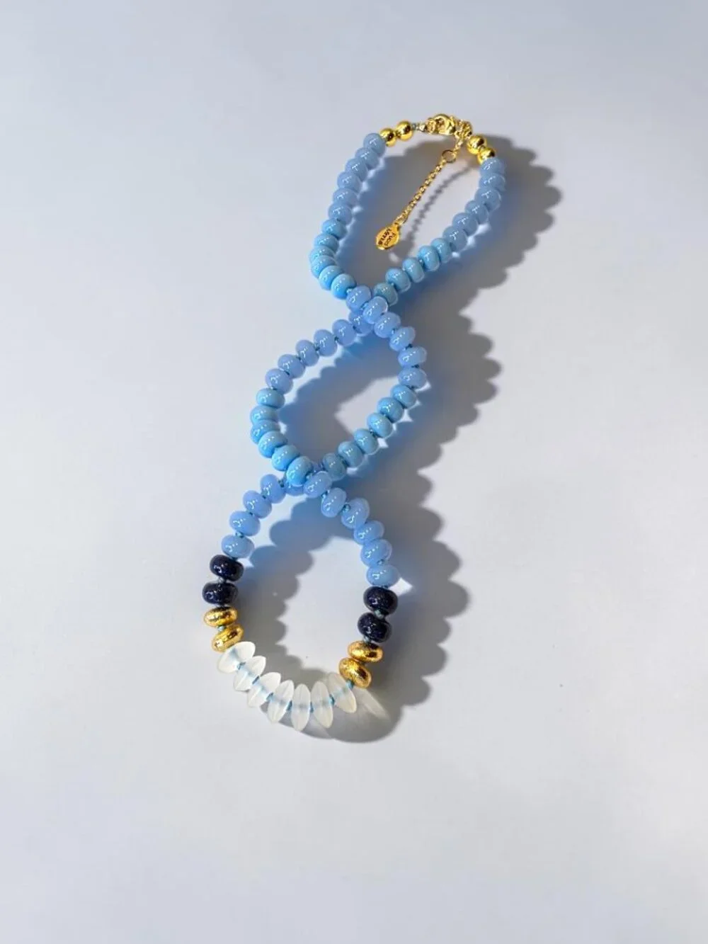 Fucci Minnulli | Jewelry | Shades Of Blue Gold Etched Bead Necklace By ...